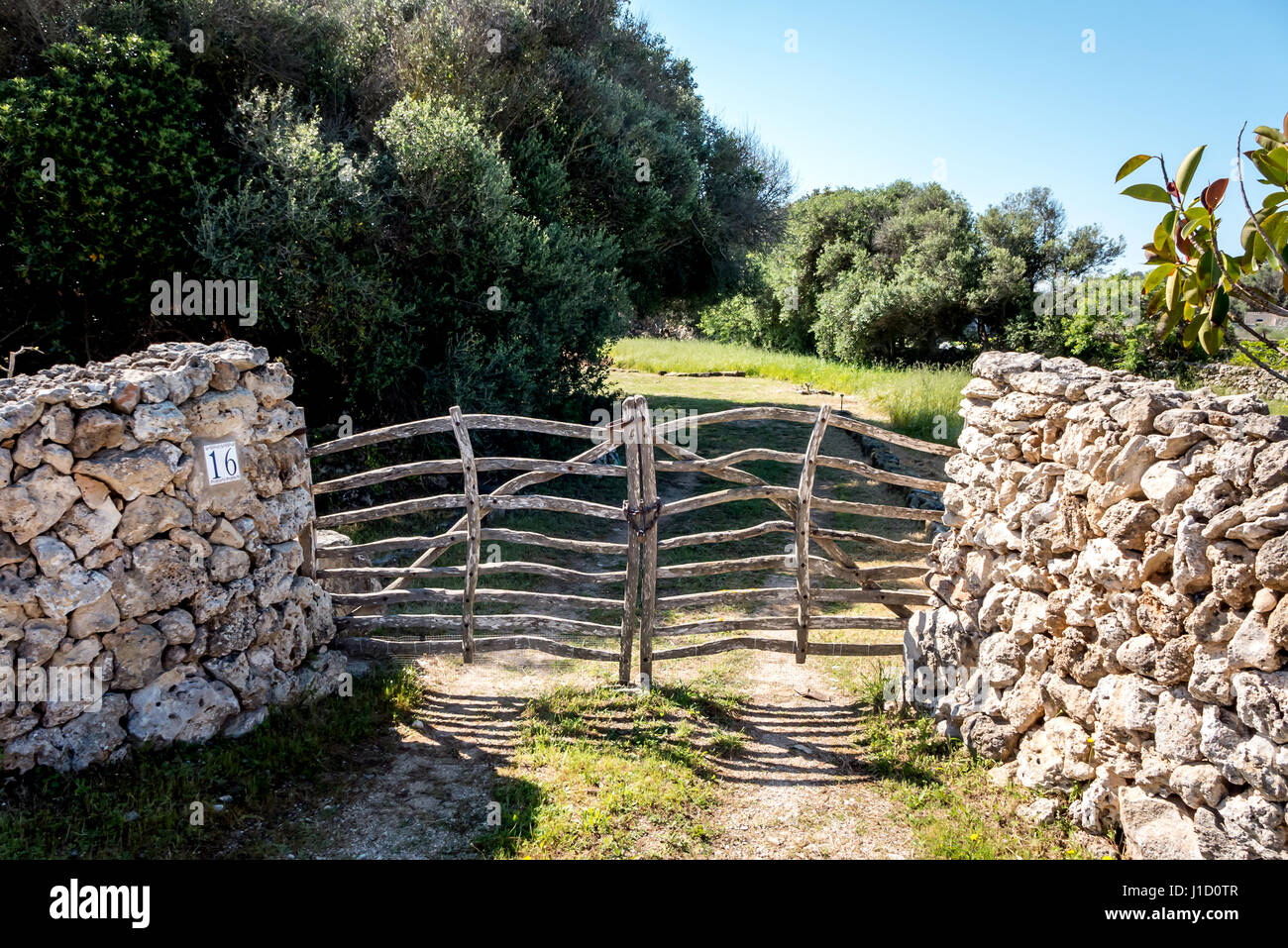 Traditional wooden gate in Menorca Stock Photo - Alamy
