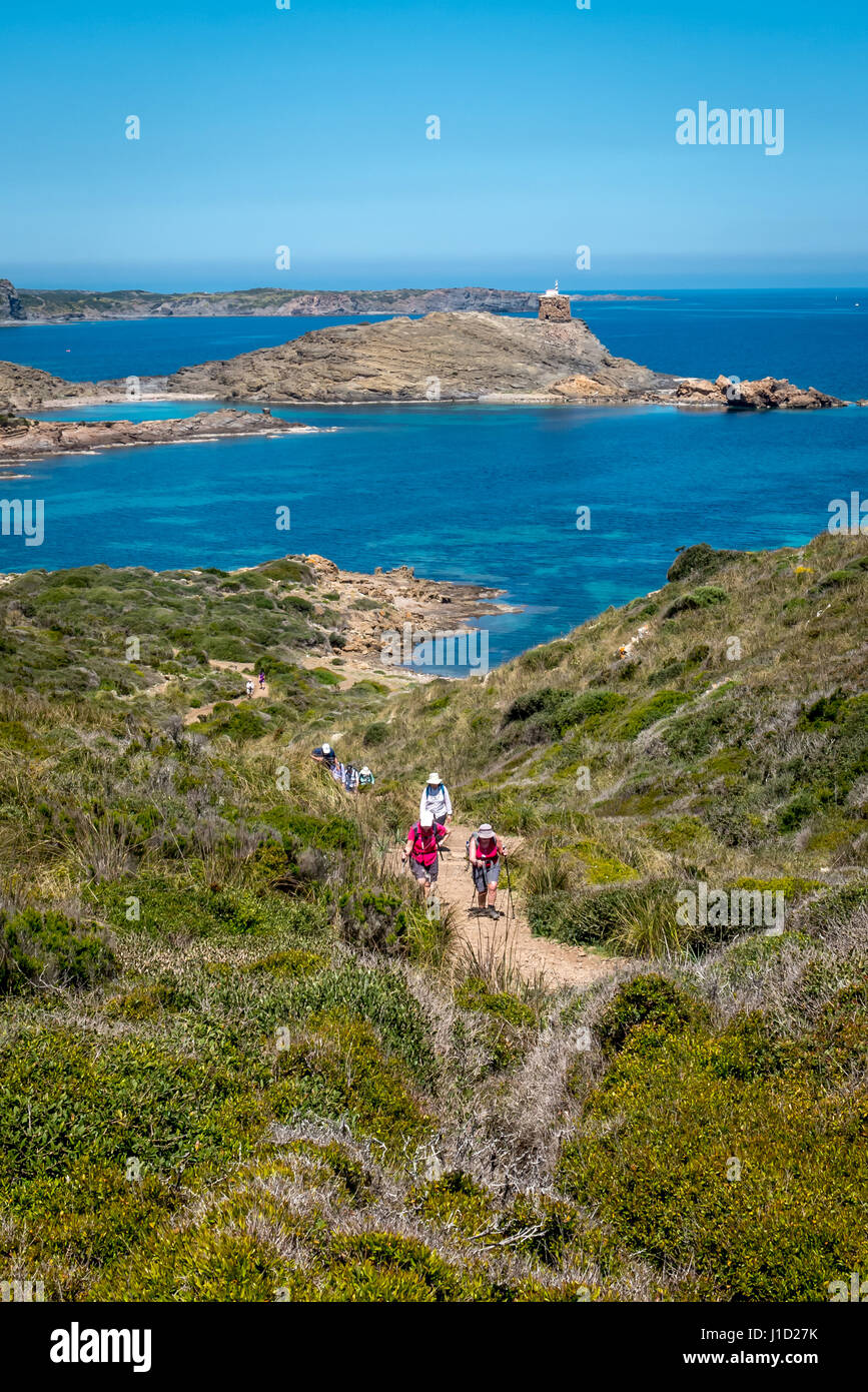 Walkers on the Cami de Cavalls coastal path in Menorca Stock Photo - Alamy