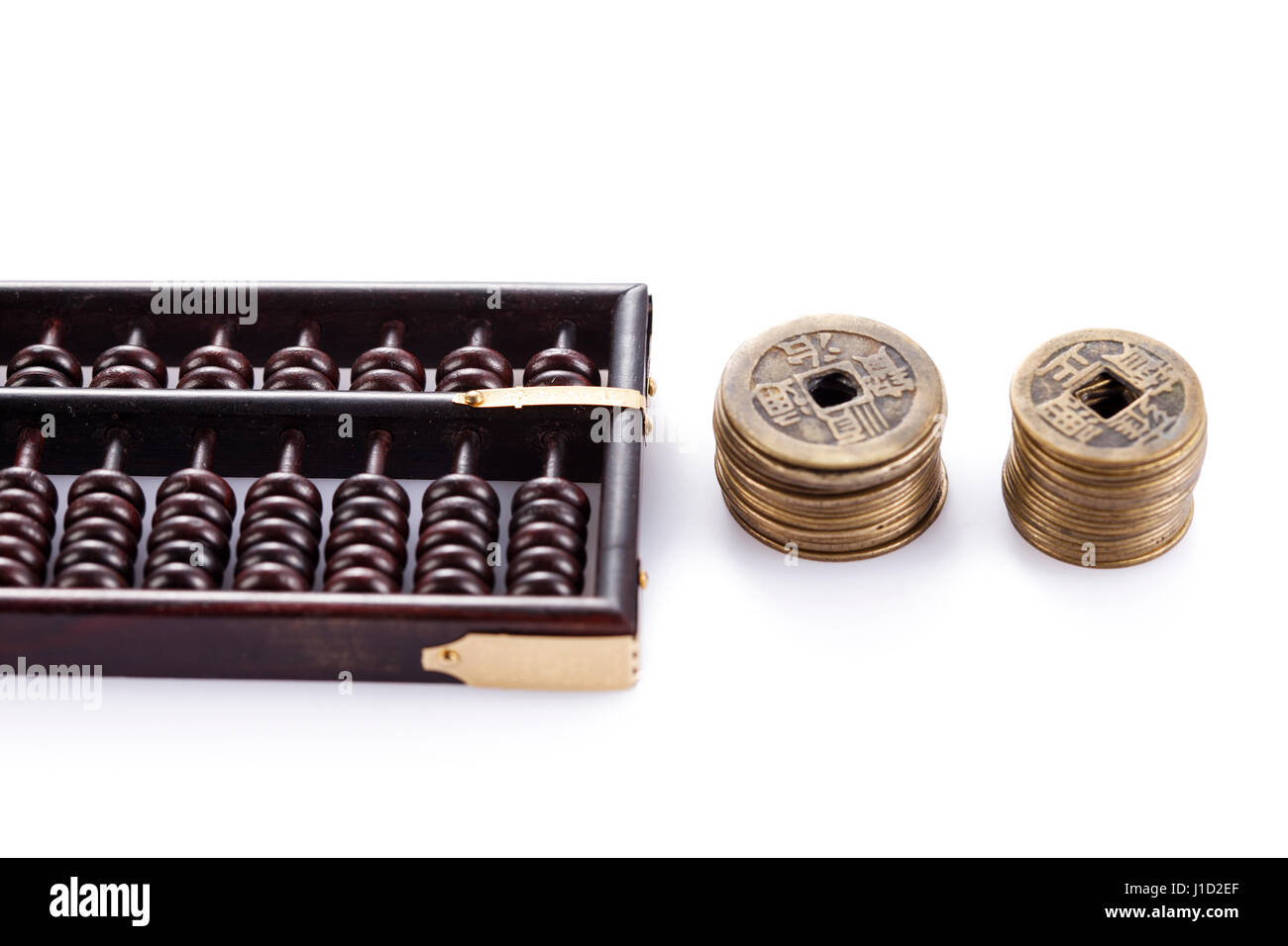 The abacus and coins Stock Photo - Alamy