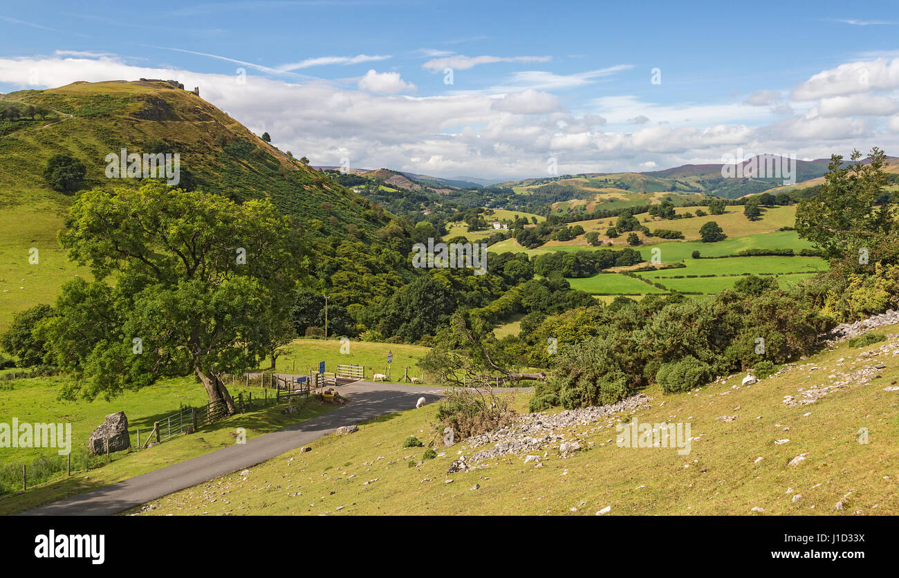 View looking west along the river Dee valley with Castell Dinas Bran on ...