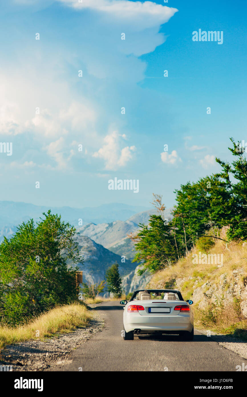 The car rides on mountain roads Stock Photo - Alamy