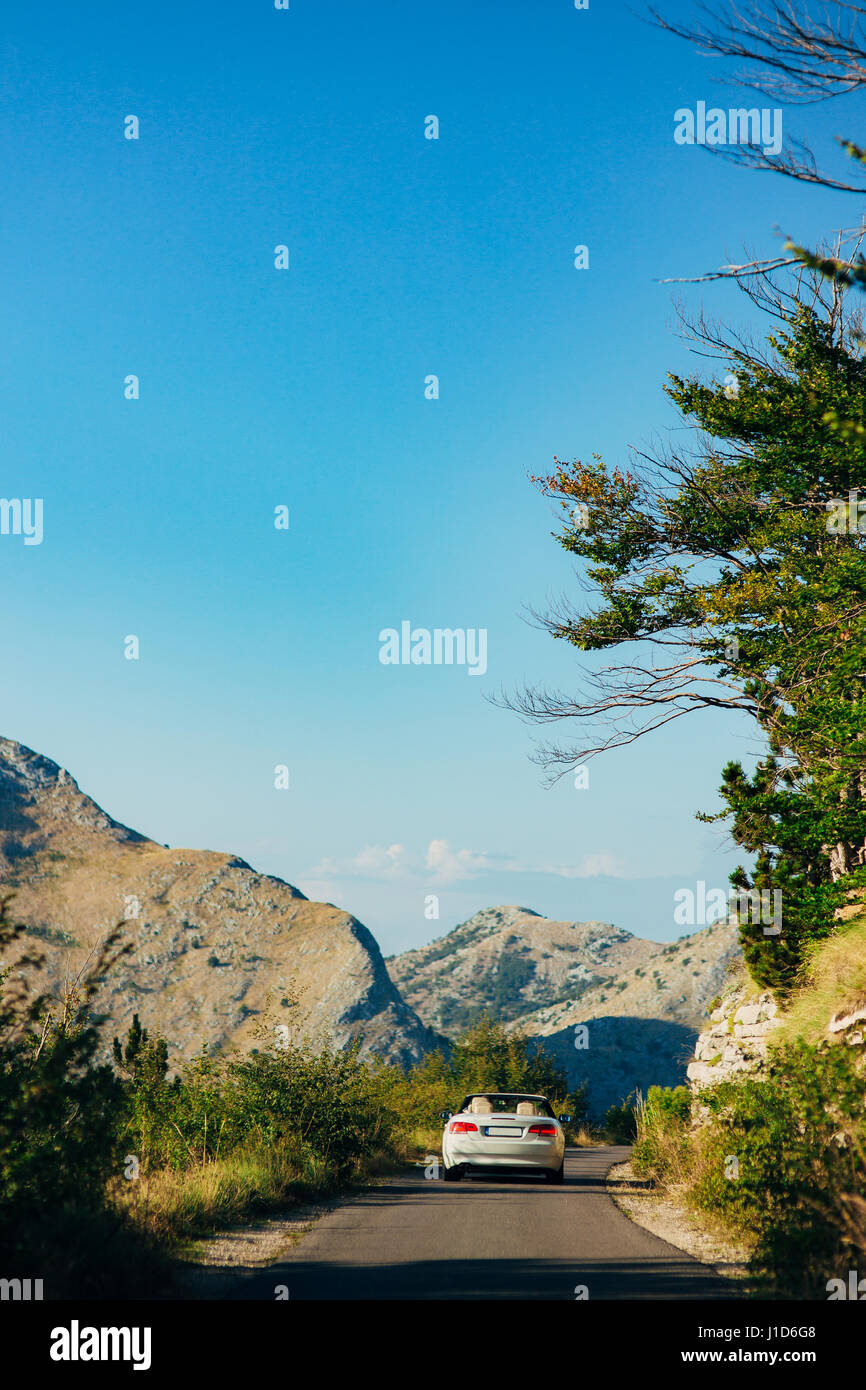 The car rides on mountain roads Stock Photo - Alamy