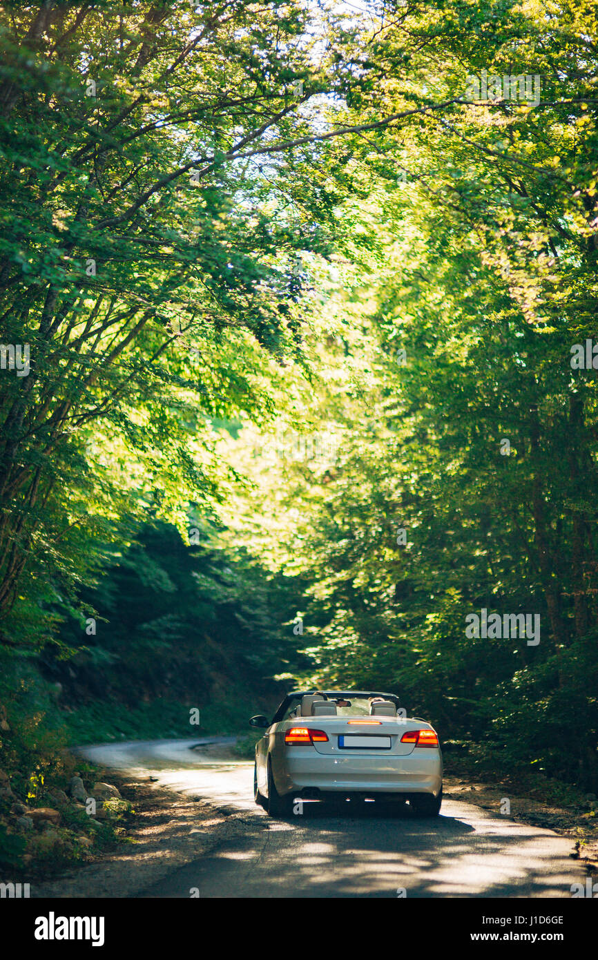 The car rides on mountain roads Stock Photo - Alamy