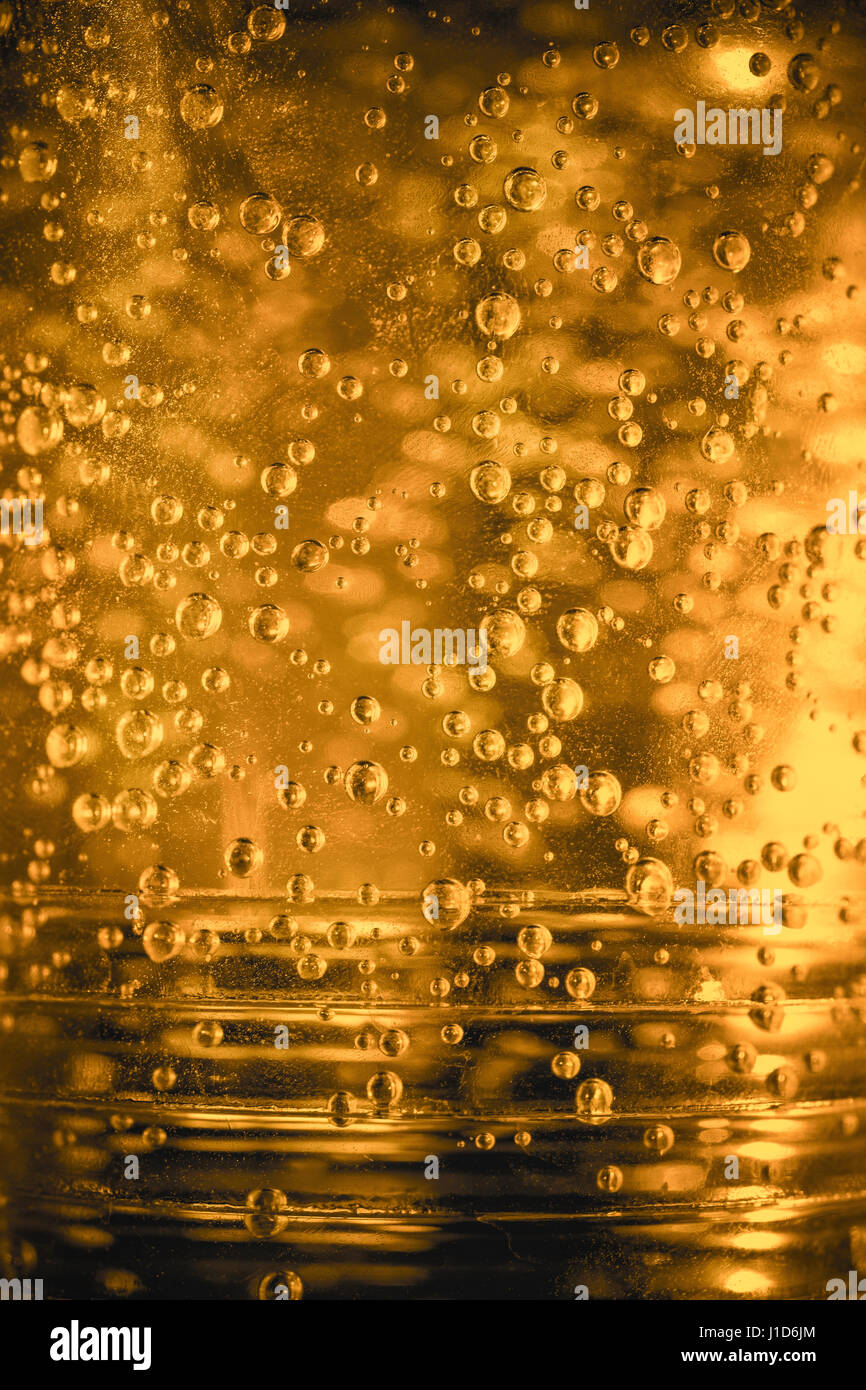 Golden water bubbles closeup macro with blurry effects Stock Photo - Alamy
