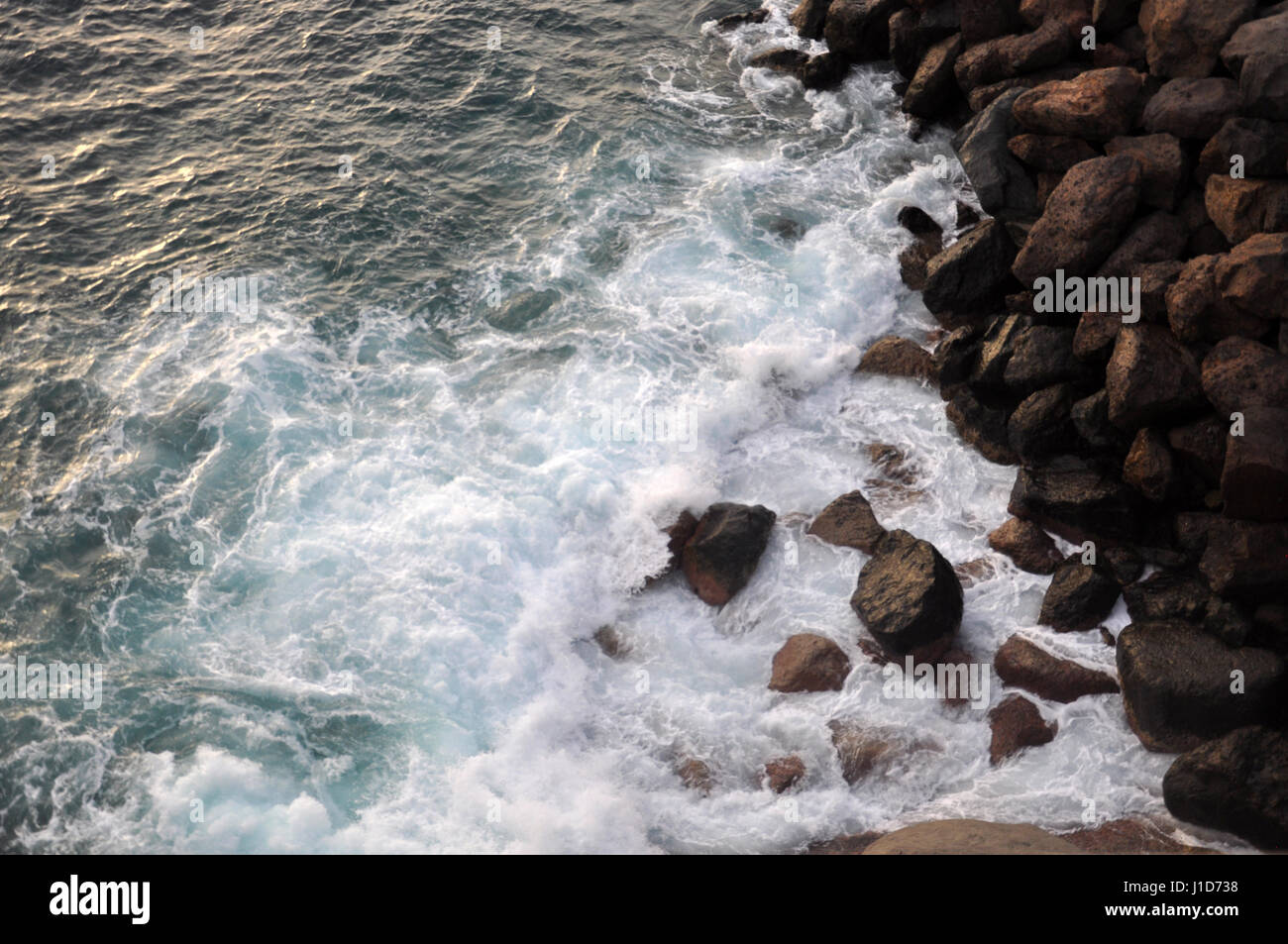Water splash - atlantic ocean waves on the cliffs and rocks on gran ...