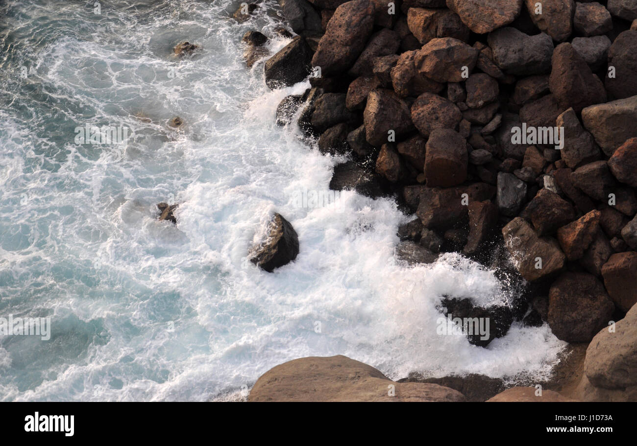 Water splash - atlantic ocean waves on the cliffs and rocks on gran ...
