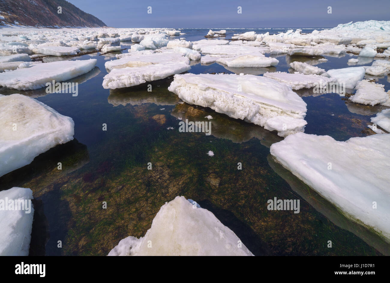 Ice hummocks on the seashore in the spring, Sakhalin Island, Russia ...
