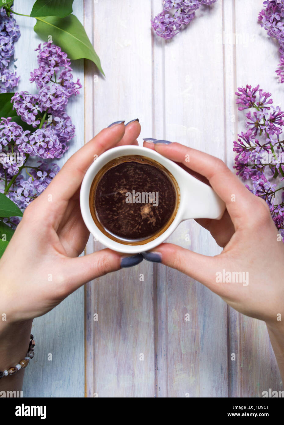 Girl having cup of coffee first person Stock Photo - Alamy