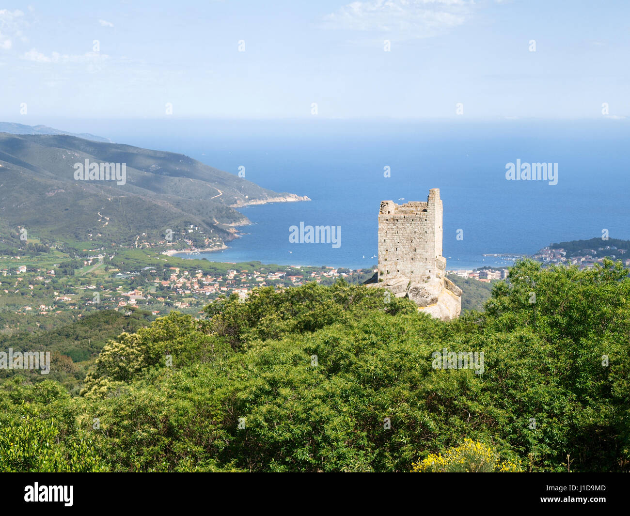 Elba, Italy: Tower of Sant'Ilario and view over Marina di Campo Stock ...