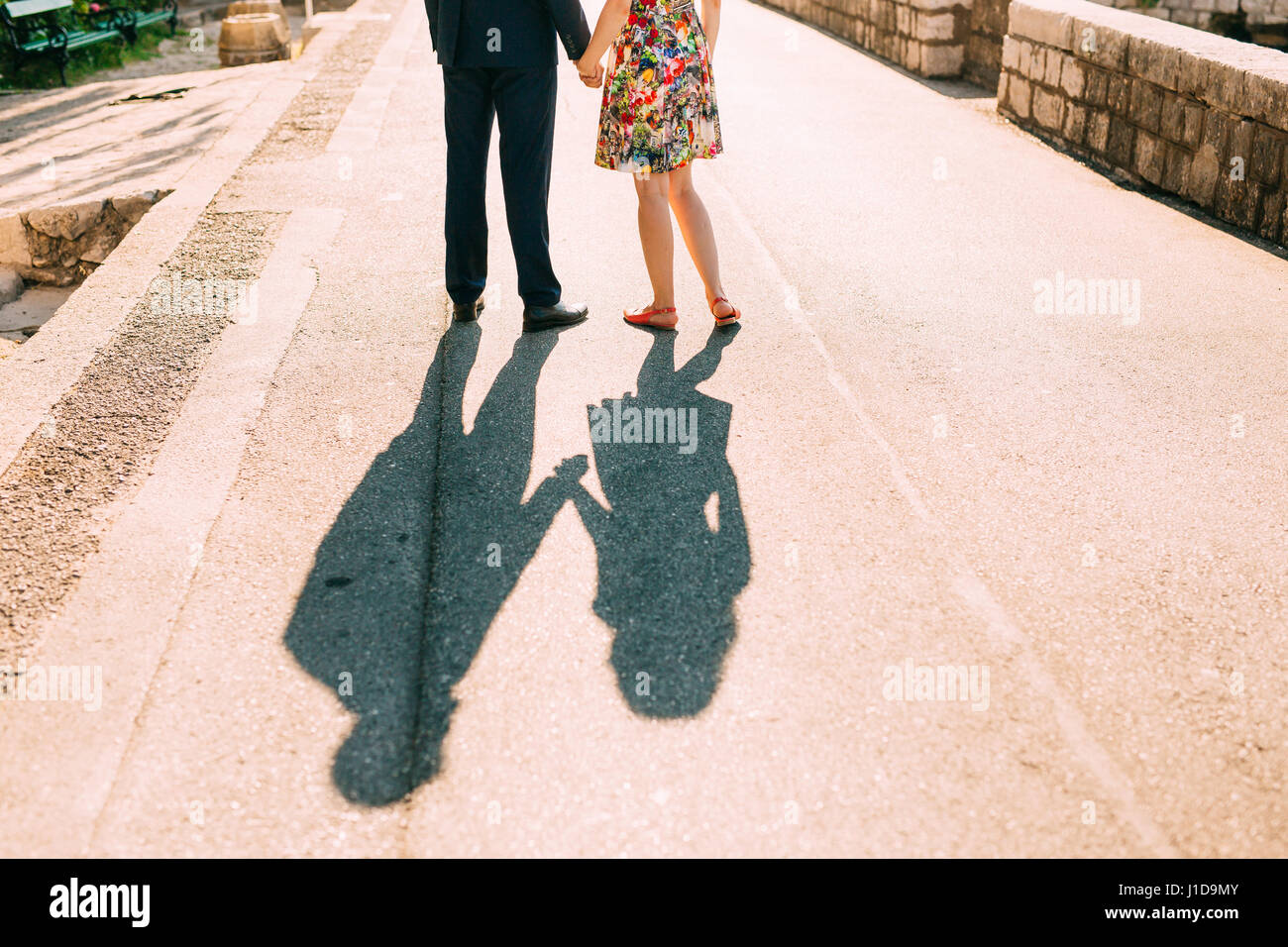Shadow of lovers on the floor Stock Photo - Alamy