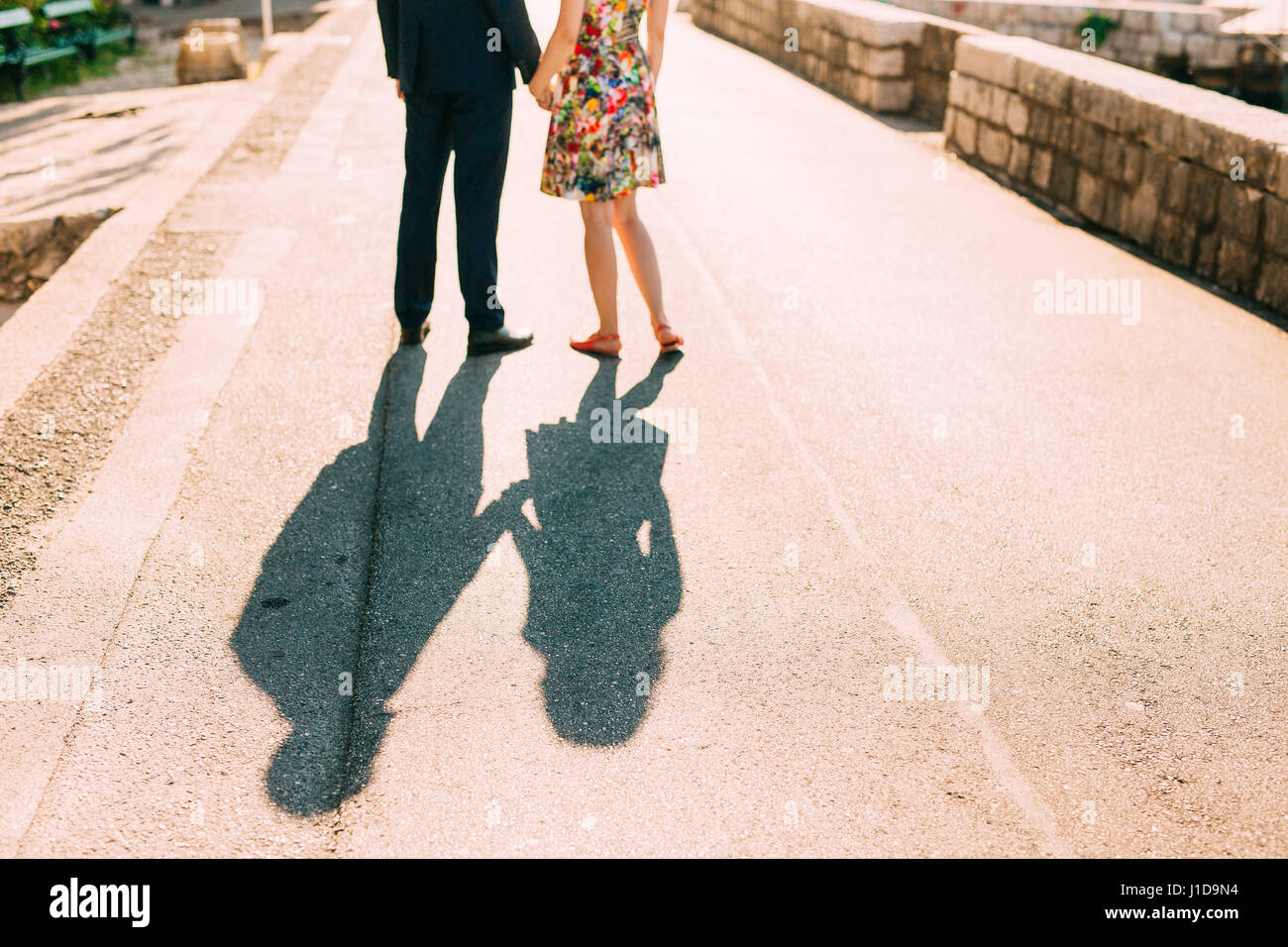 Shadow of lovers on the floor Stock Photo - Alamy
