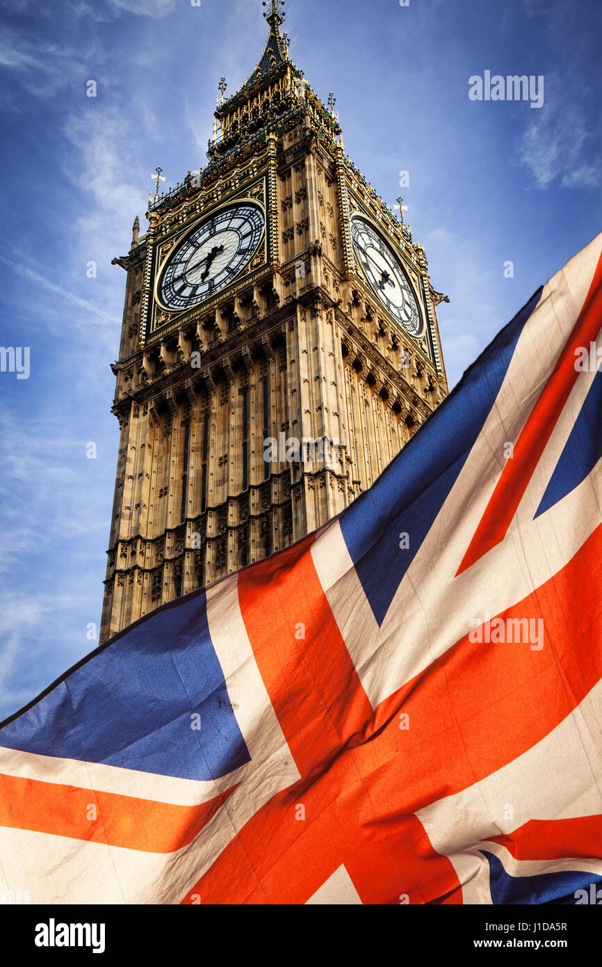 union jack flag and iconic Big Ben at the palace of Westminster, London ...