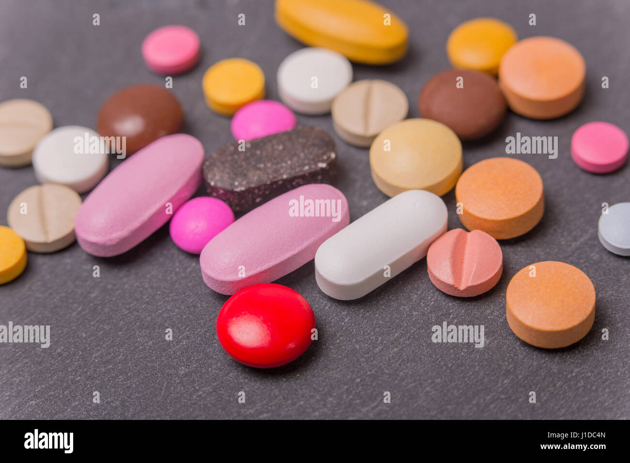 different Tablets pills capsule heap mix therapy drugs Stock Photo - Alamy