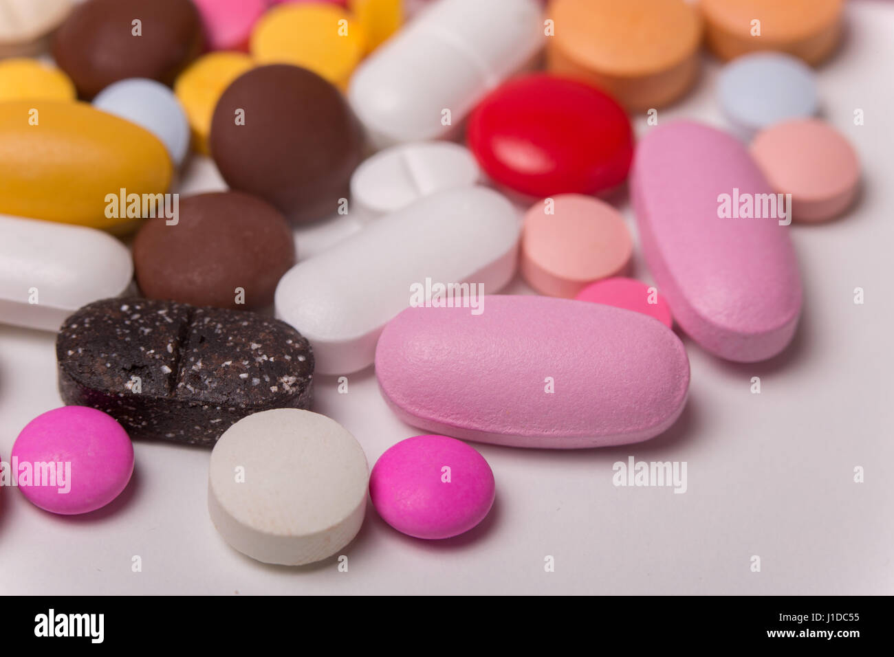 different Tablets pills capsule heap mix therapy drugs Stock Photo - Alamy