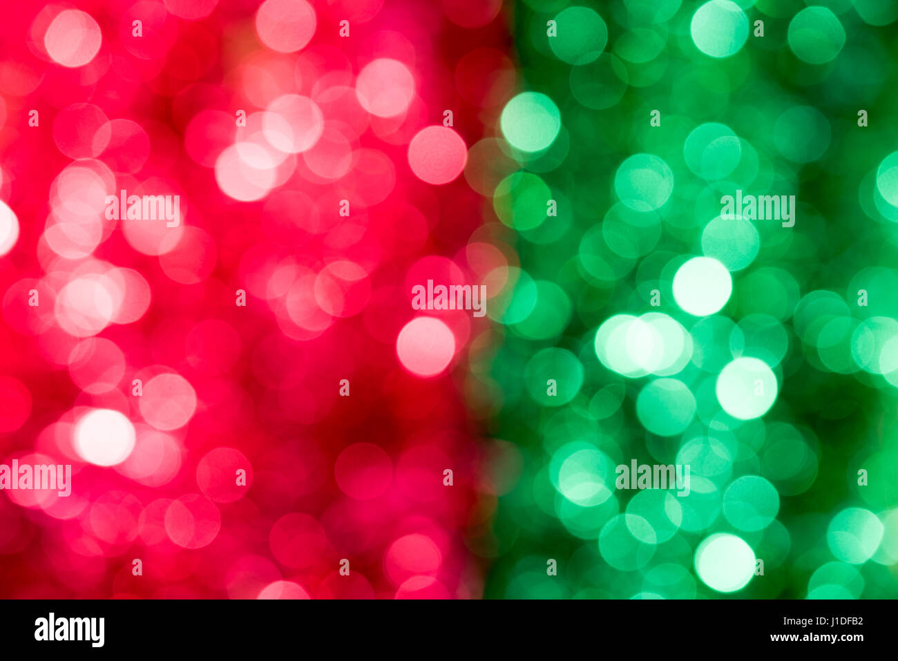 Red and green blurred abstract bokeh light backgound form streamer ...