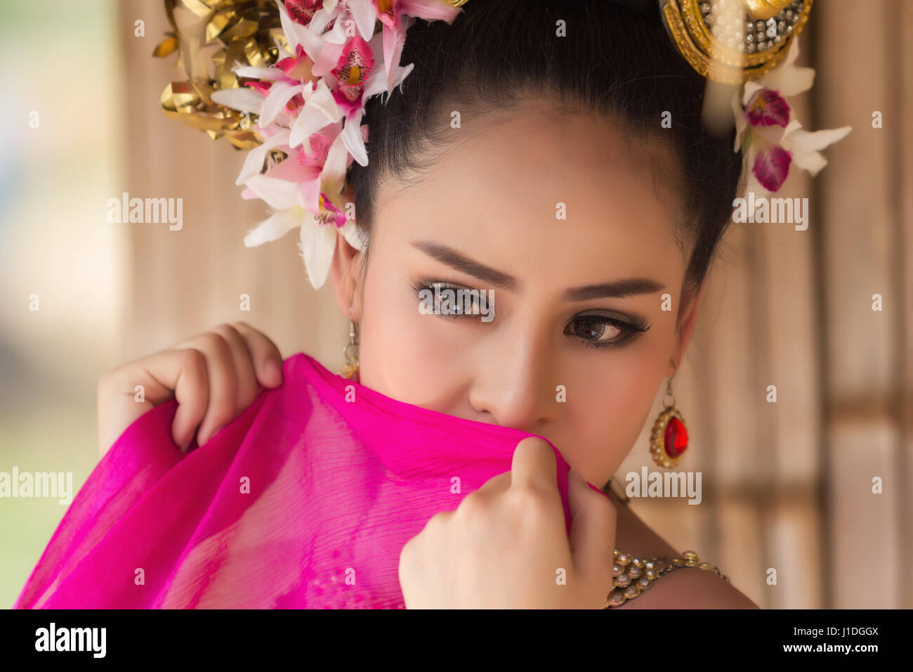 Close up beautiful thai woman face wear thai dress Stock Photo - Alamy
