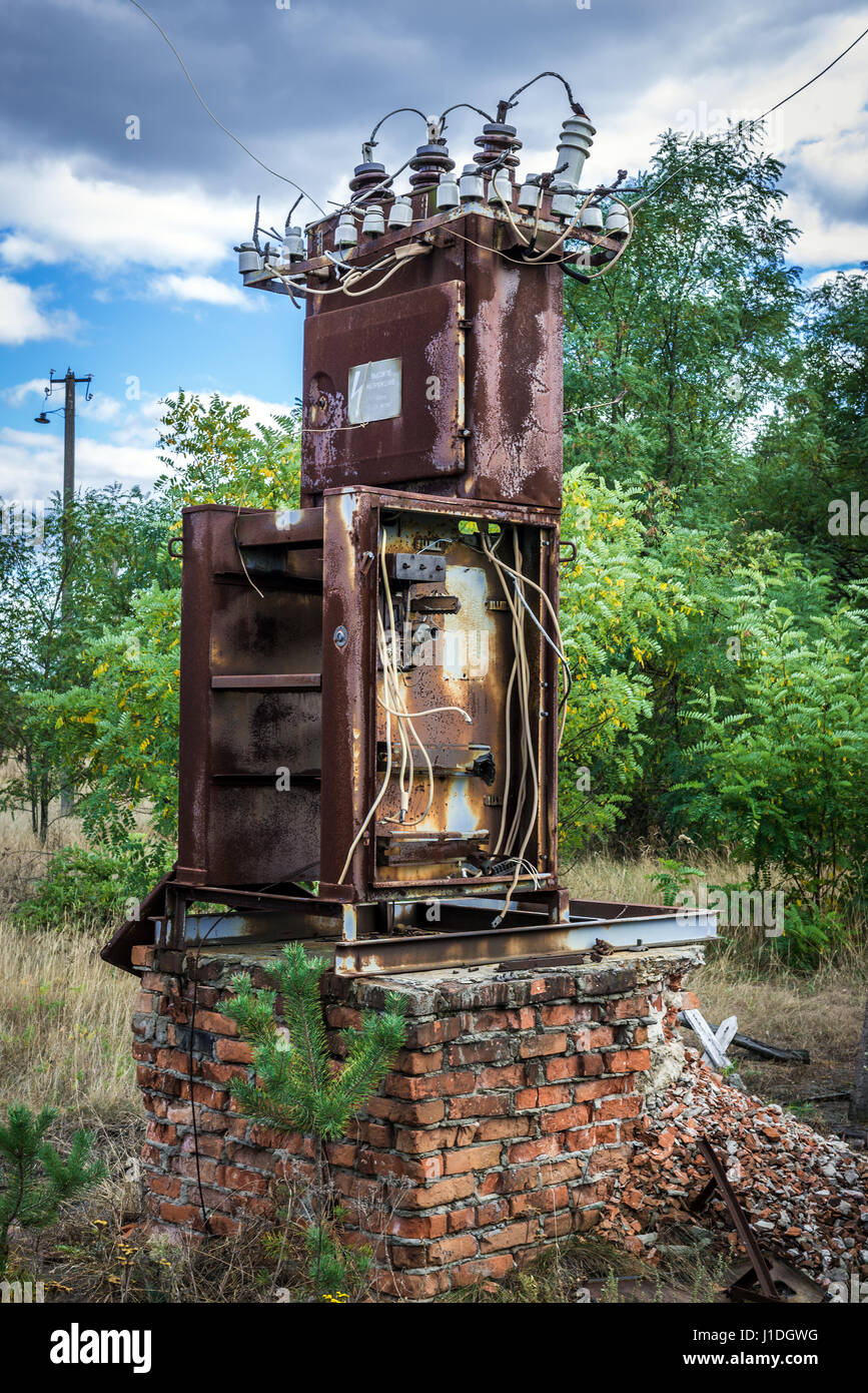 Rusty electrical box in old kolkhoz near Mashevo village of Chernobyl ...