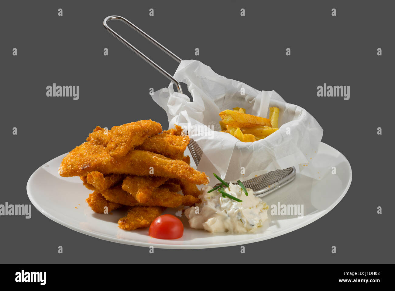 A portion of chicken cooked with French fries Stock Photo - Alamy