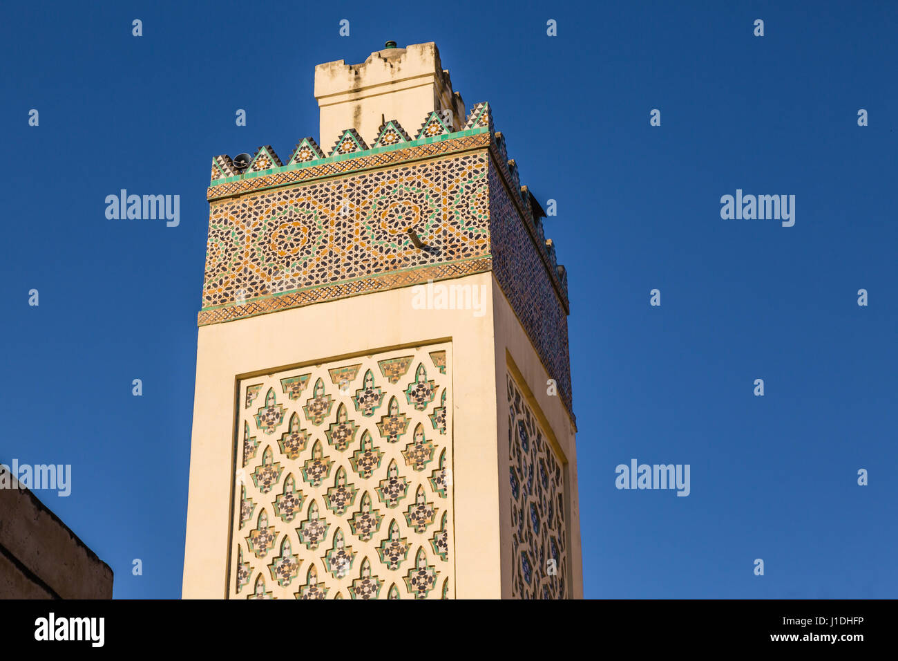 Minaret of a mosque in Medina Fes, Morocco Stock Photo - Alamy