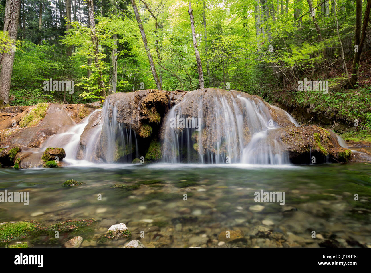 Beautiful mountain waterfall Stock Photo - Alamy