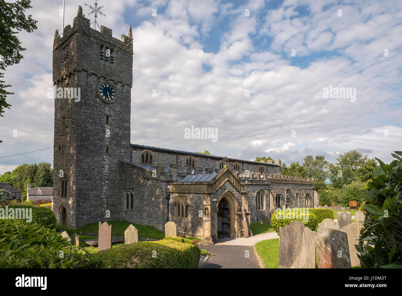 St Michael's & All Angels Church, Beetham, stands in the village of ...