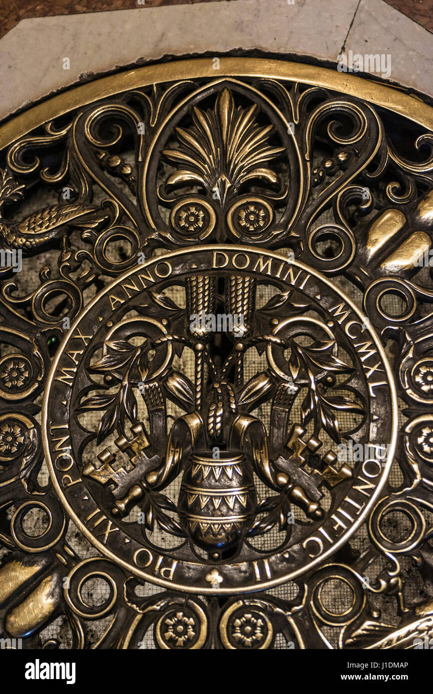 Vatican City, Vatican - January 4, 2017: Vatican shield of metal on the ...