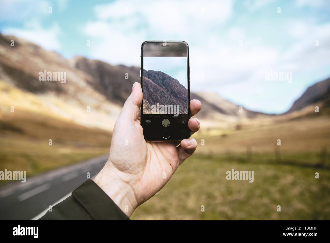 Hand taking photo mountains hi-res stock photography and images - Alamy