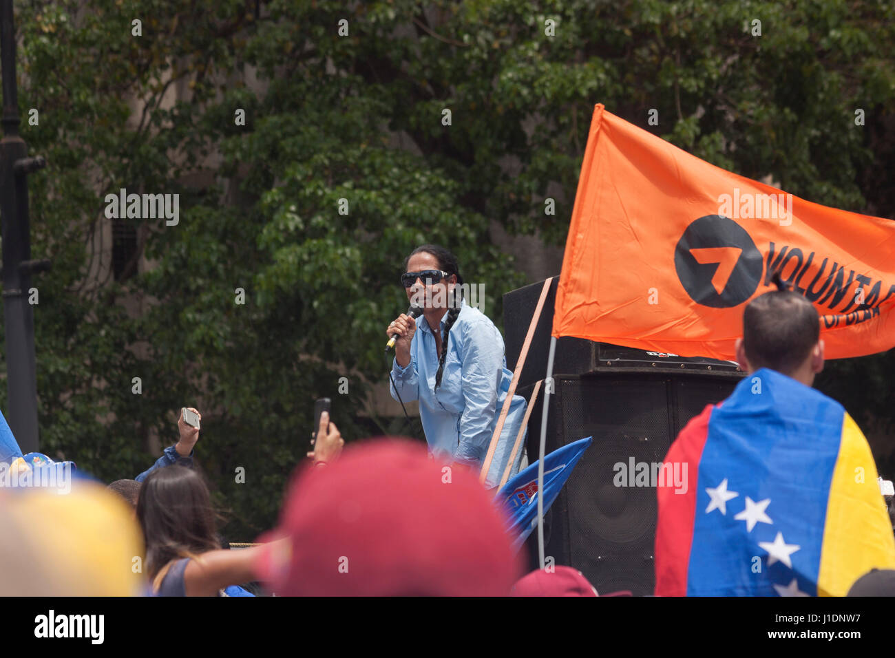 A member of the Venezuelan political party “Voluntad Popular gives a ...