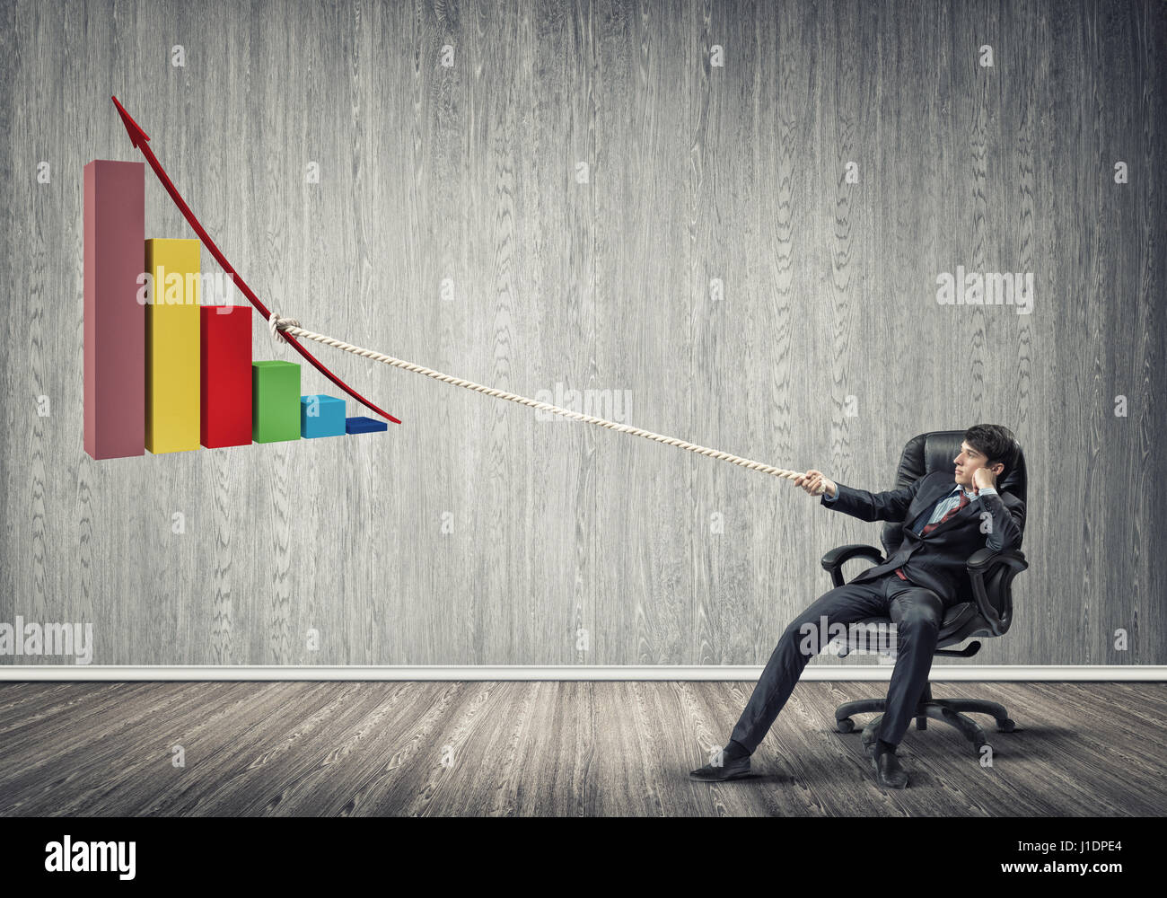 Businessman pulling graph with rope as concept of power and control ...