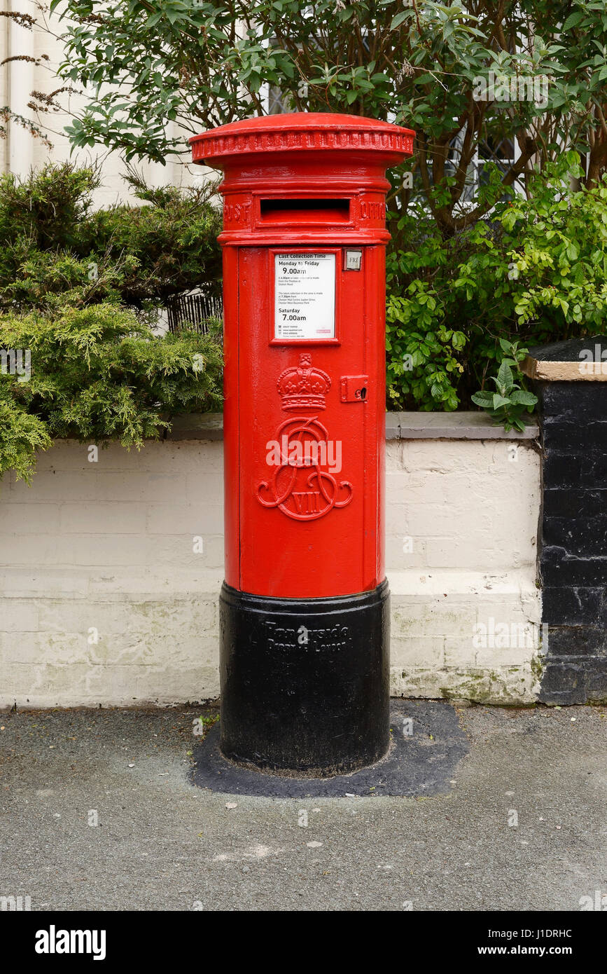 A red post office pillar box with the cypher ER Vii on the side ...
