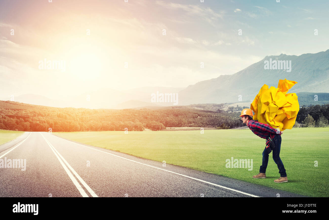 Engineer man carry load Stock Photo - Alamy