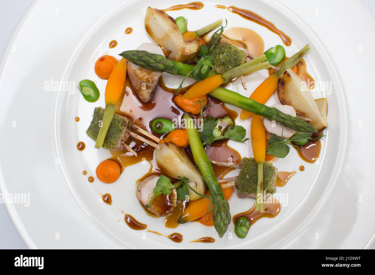 Loin of rabbit, carrot puree, asparagus, broad beans and cep mushrooms ...