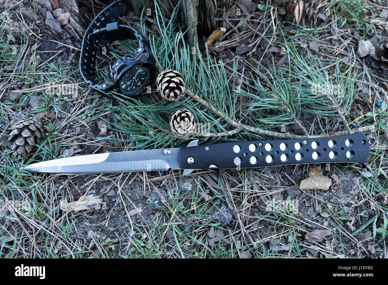 Tactical knife with a long sharp blade Stock Photo - Alamy