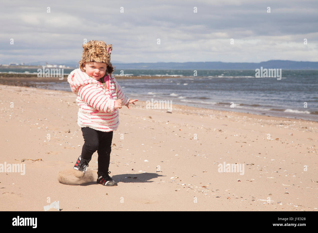Musselburgh promenade, Edinburgh, Scotland, UK. Baby in beach in sunny ...