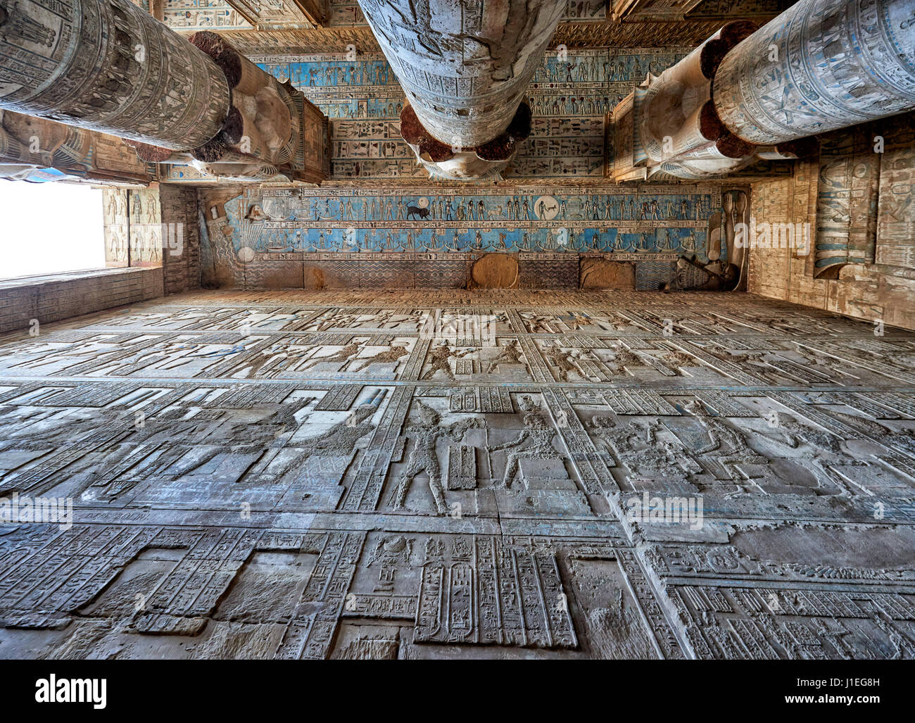 ceiling with colored stone carving, hieroglyphs and columns of Hathor ...
