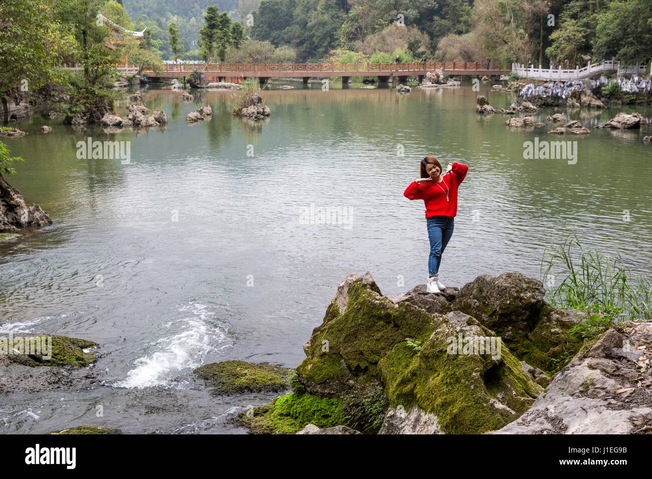 China, Guizhou, Dragon Palace Scenic Area. Tourist Posing for a Photo ...