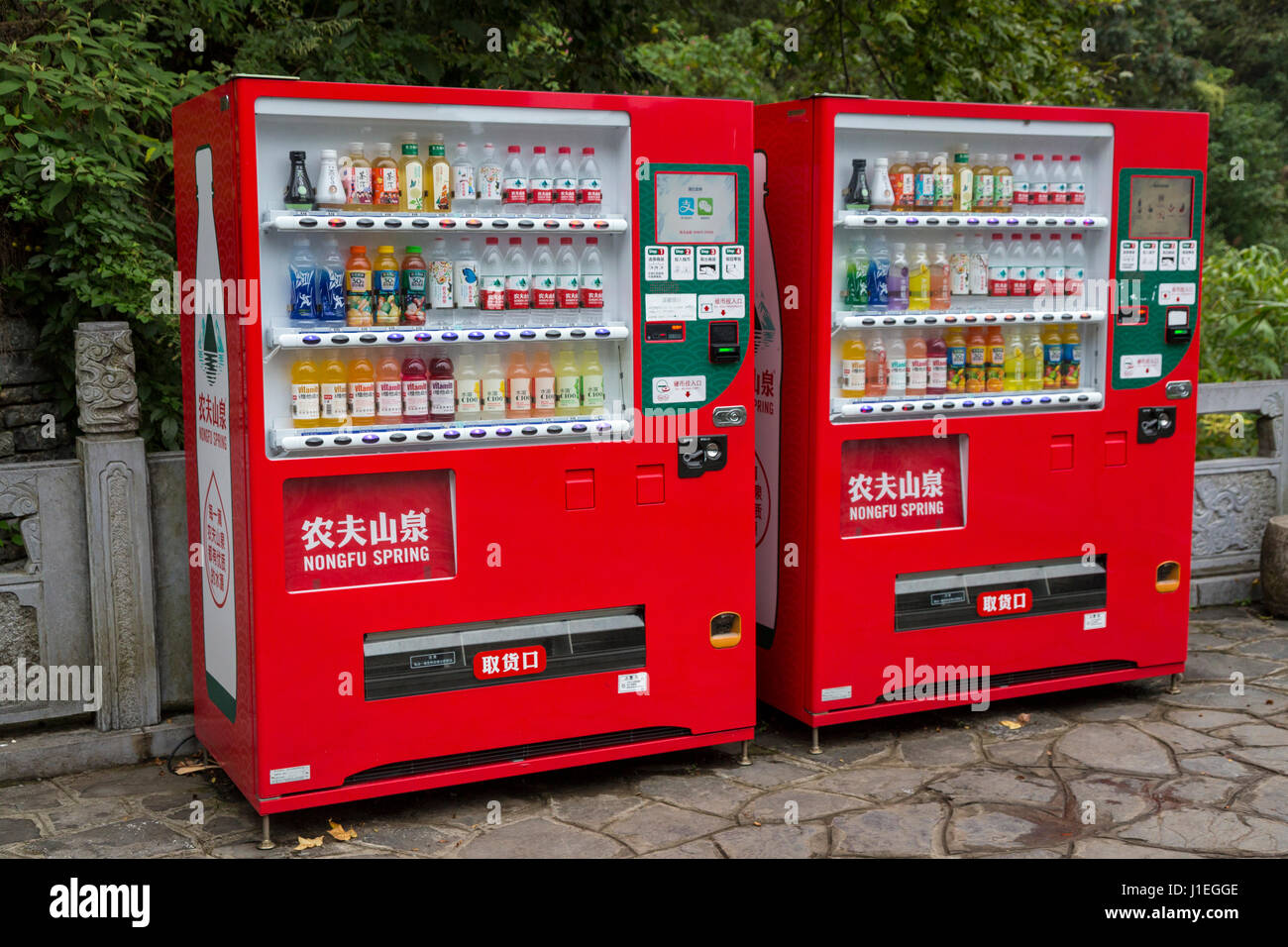China, Guizhou, Dragon Palace Scenic Area. Water and Juice Vending ...