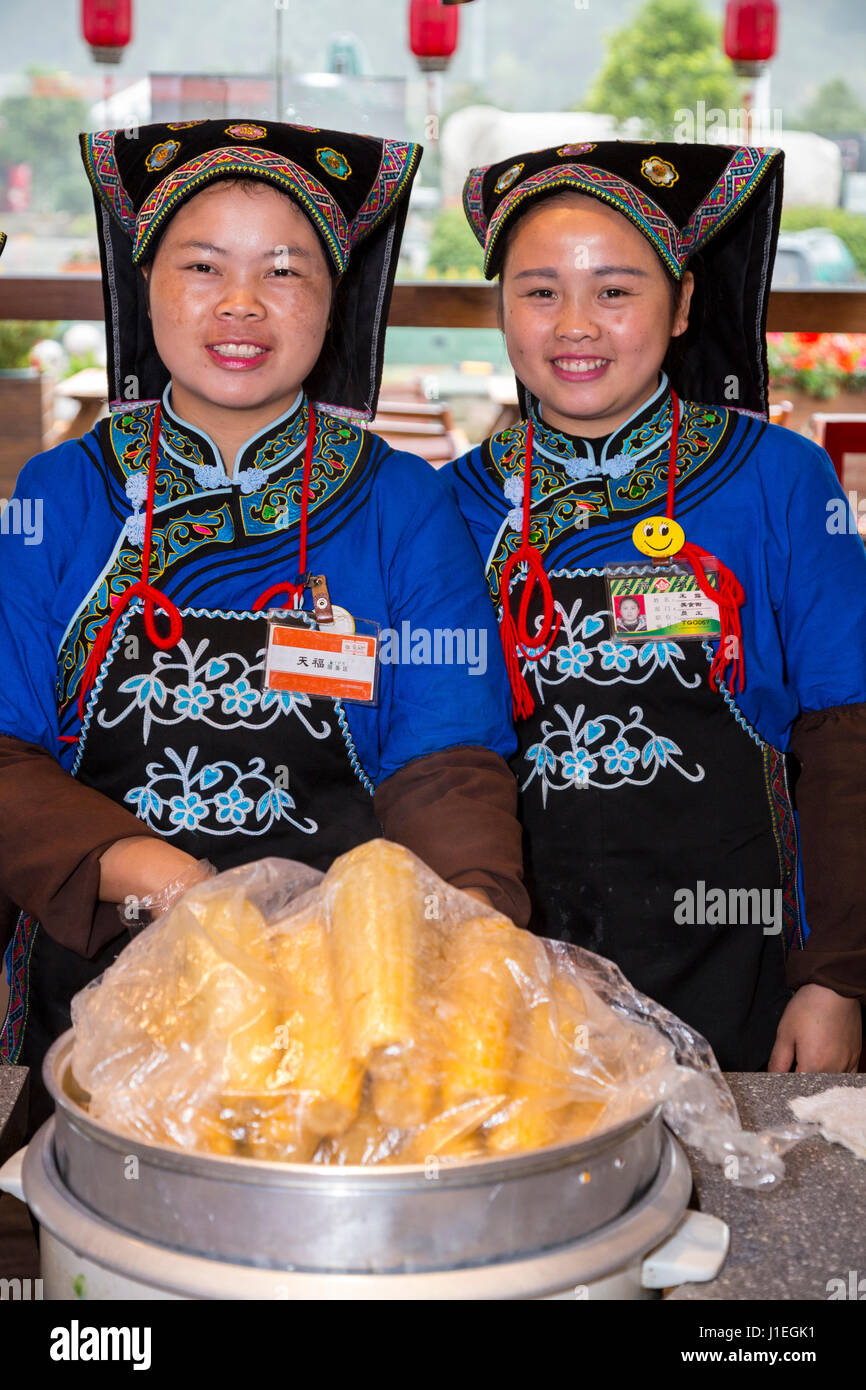 Guizhou, China. Young Han Chinese Women in Bouyei Dress, working in a ...