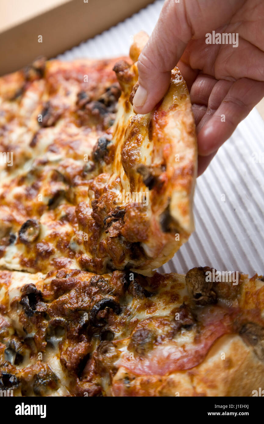 Grabbing meat hi-res stock photography and images - Alamy