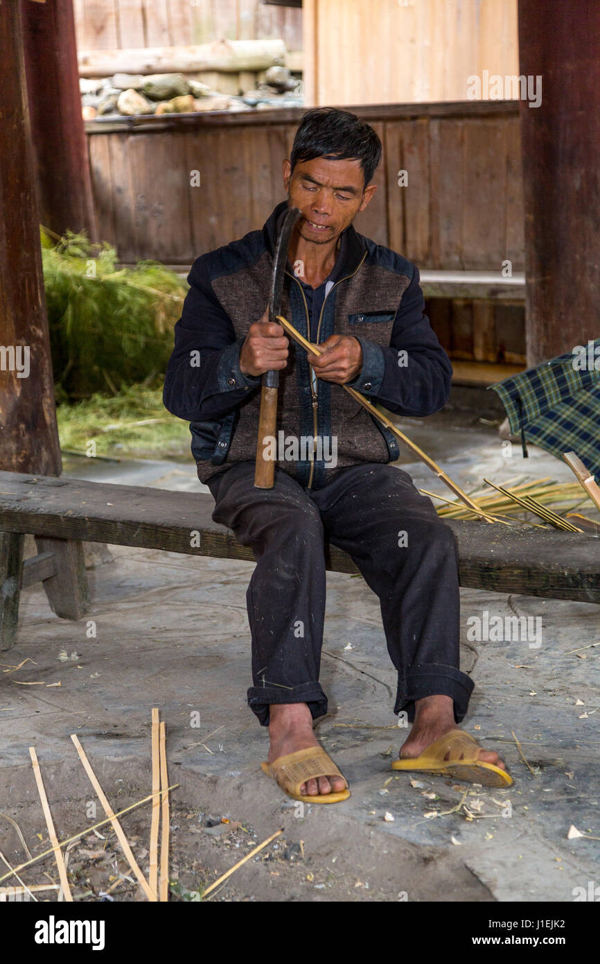 Huanggang, Guizhou, China. Dong Man Making Chopsticks in a Dong Village ...