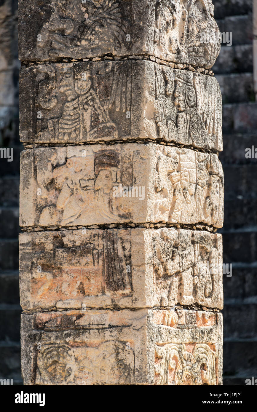 Ornately carved column in the ruins of the once great Mayan city of ...