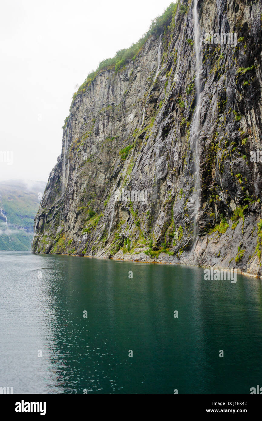 waterfall and View in the Geiranger fjord, Norway Stock Photo - Alamy