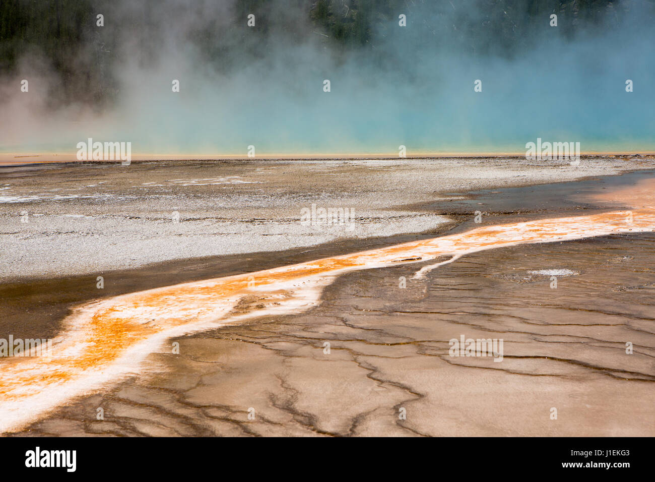 Steam rises above the vivid colors and mineral deposits of Grand ...