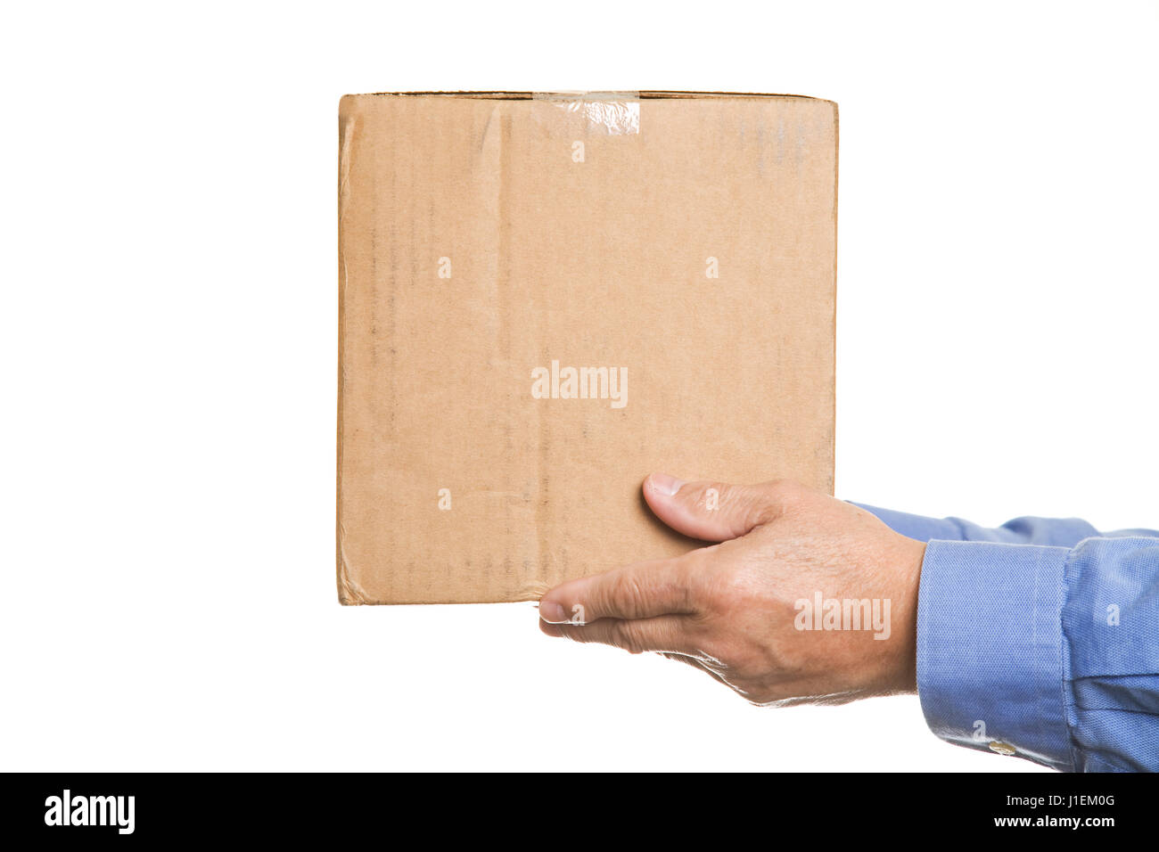 A shot of a man handing out a box Stock Photo - Alamy