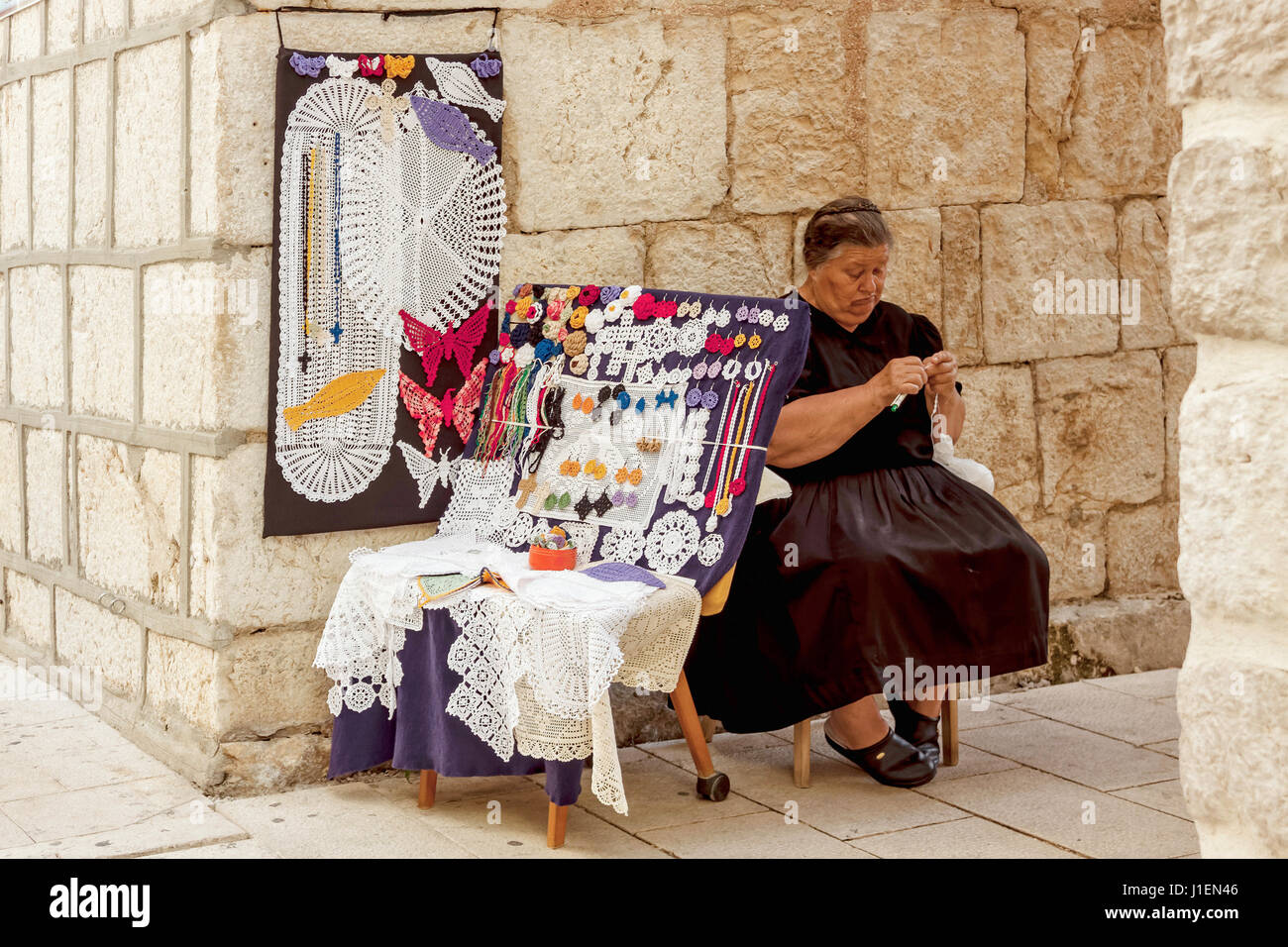 Woman doing Pag lace (Paška čipka) in Pag town, Pag island, Croatia ...
