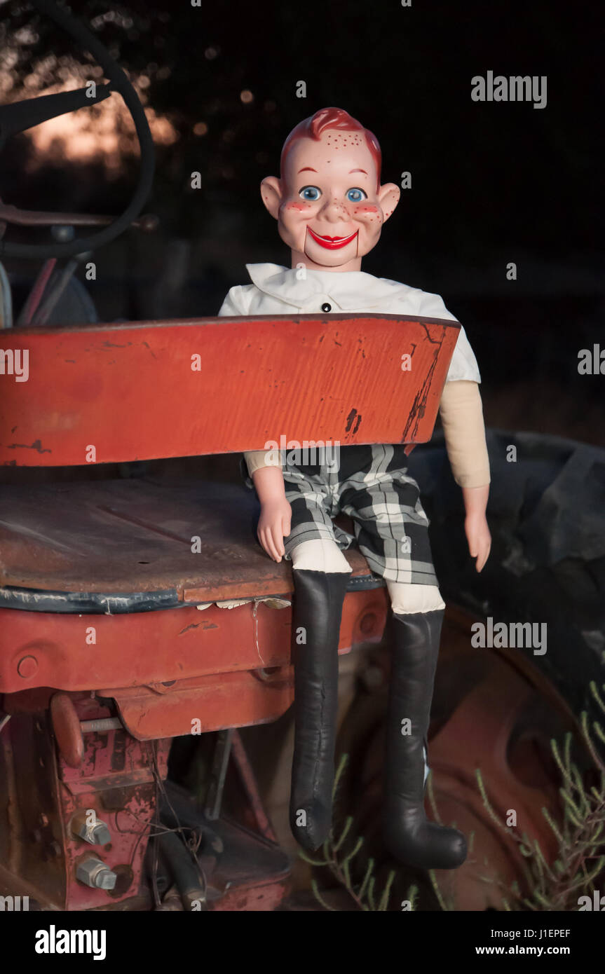 Howdy Doody ventriloquist doll sitting on an old tractor Stock Photo ...