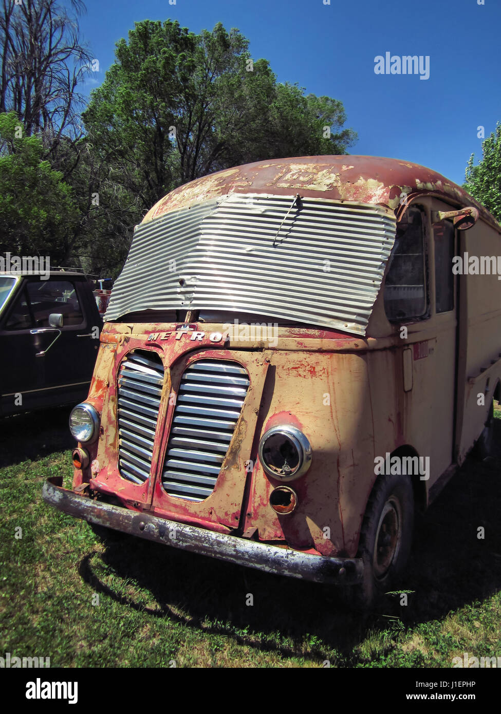 Vintage metro van parked outdoors in a grassy area Stock Photo - Alamy