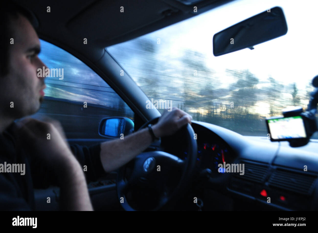 Man driving with Speed Background Stock Photo - Alamy