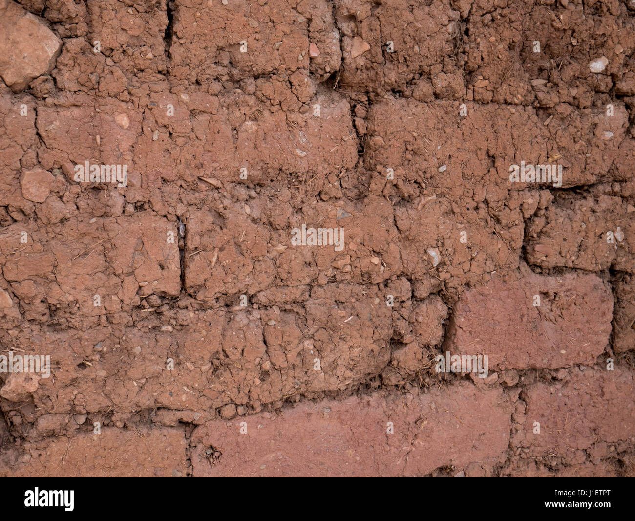 Texture of mud brick wall Stock Photo - Alamy