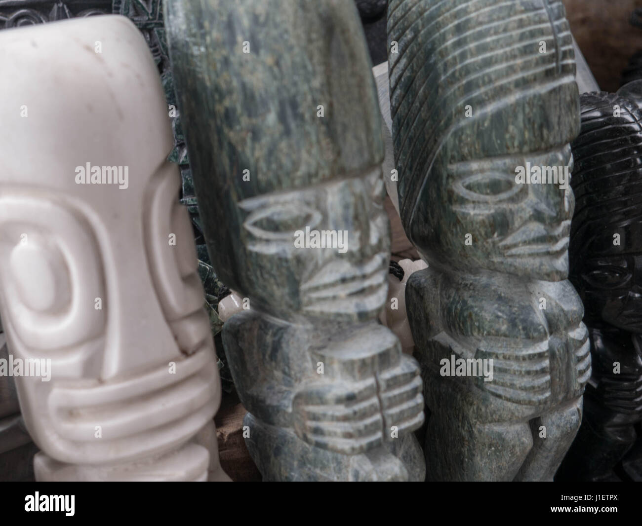 God Pieces of peruvian inca carved figures Stock Photo - Alamy